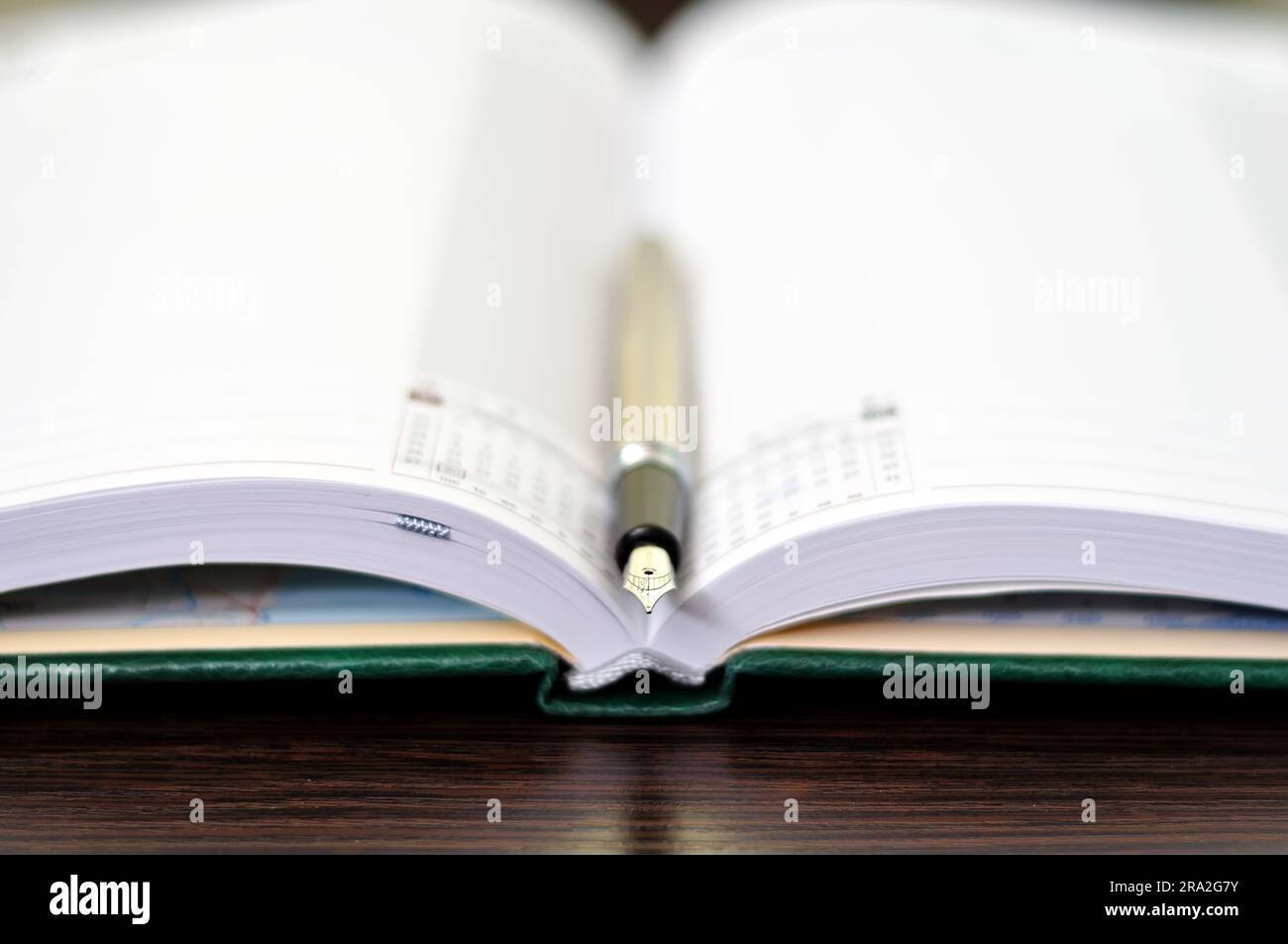 Open planner on table hi-res stock photography and images - Alamy