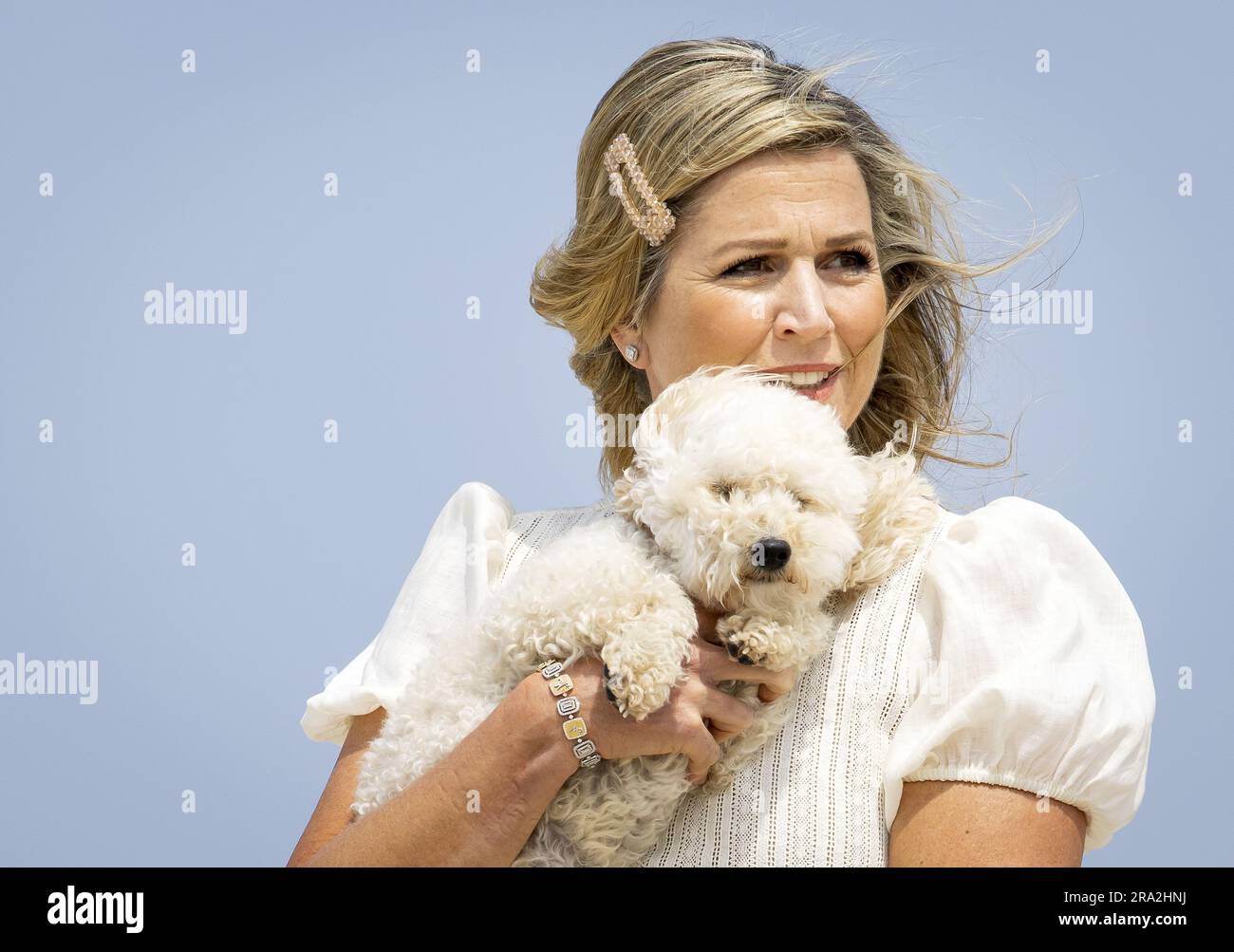 THE HAGUE - Queen Maxima with dog Mambo on the Zuiderstrand during the ...