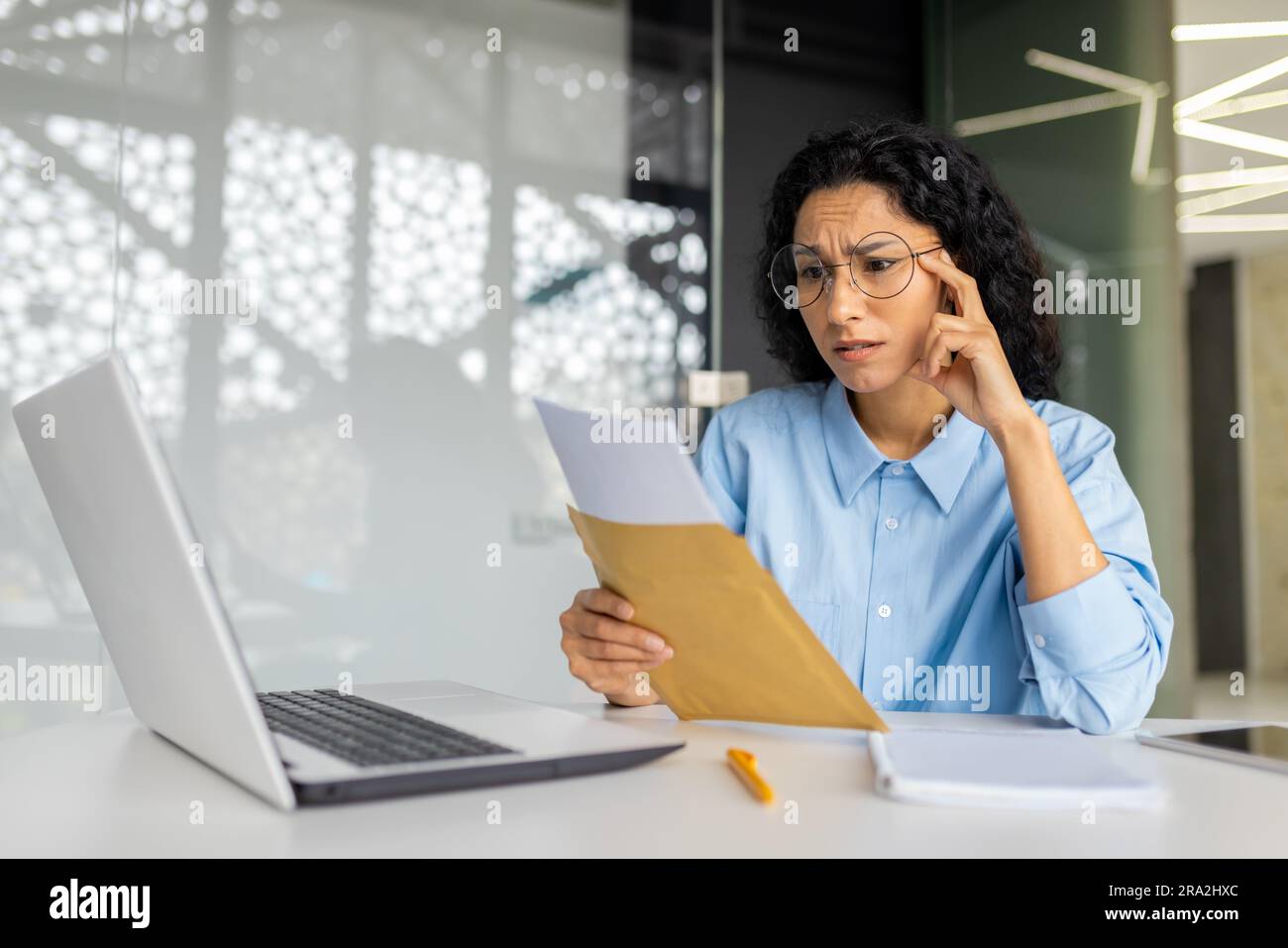 Upset and sad business woman received mail convo letter notification ...