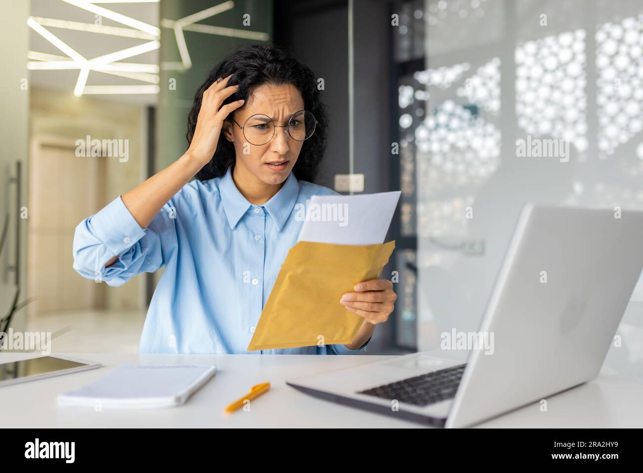 Upset and sad business woman received mail convo letter notification ...
