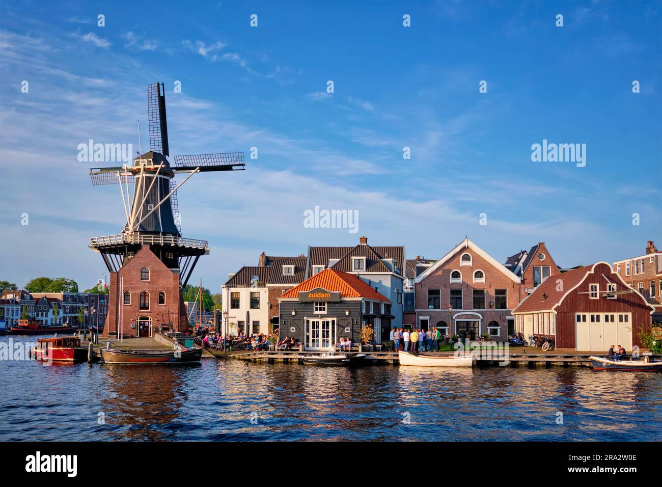 Harlem landmark windmill De Adriaan and boat on Spaarne river Stock ...