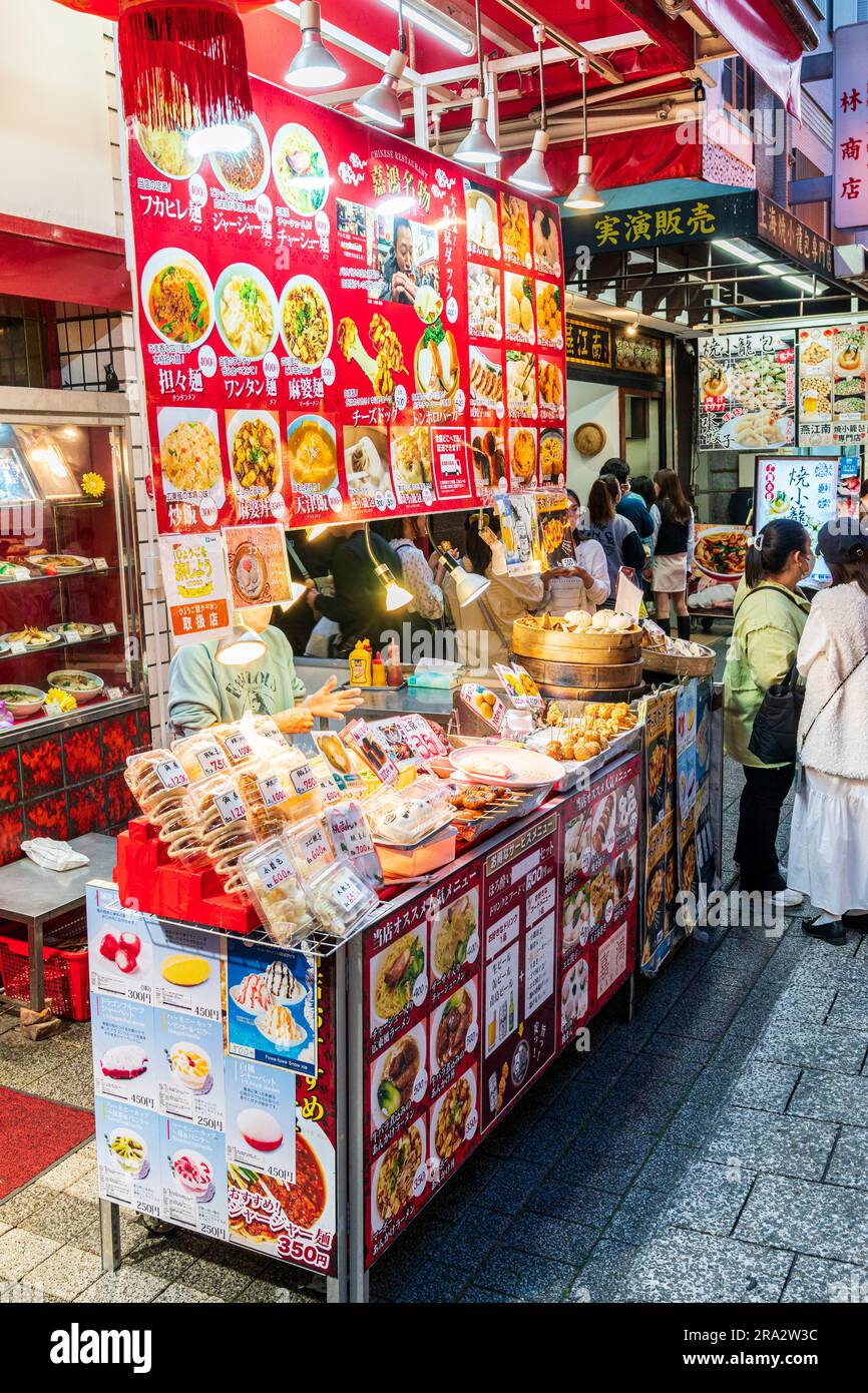 Chinese takeaway food stall at night time in Nankinmachi, Chinatown ...