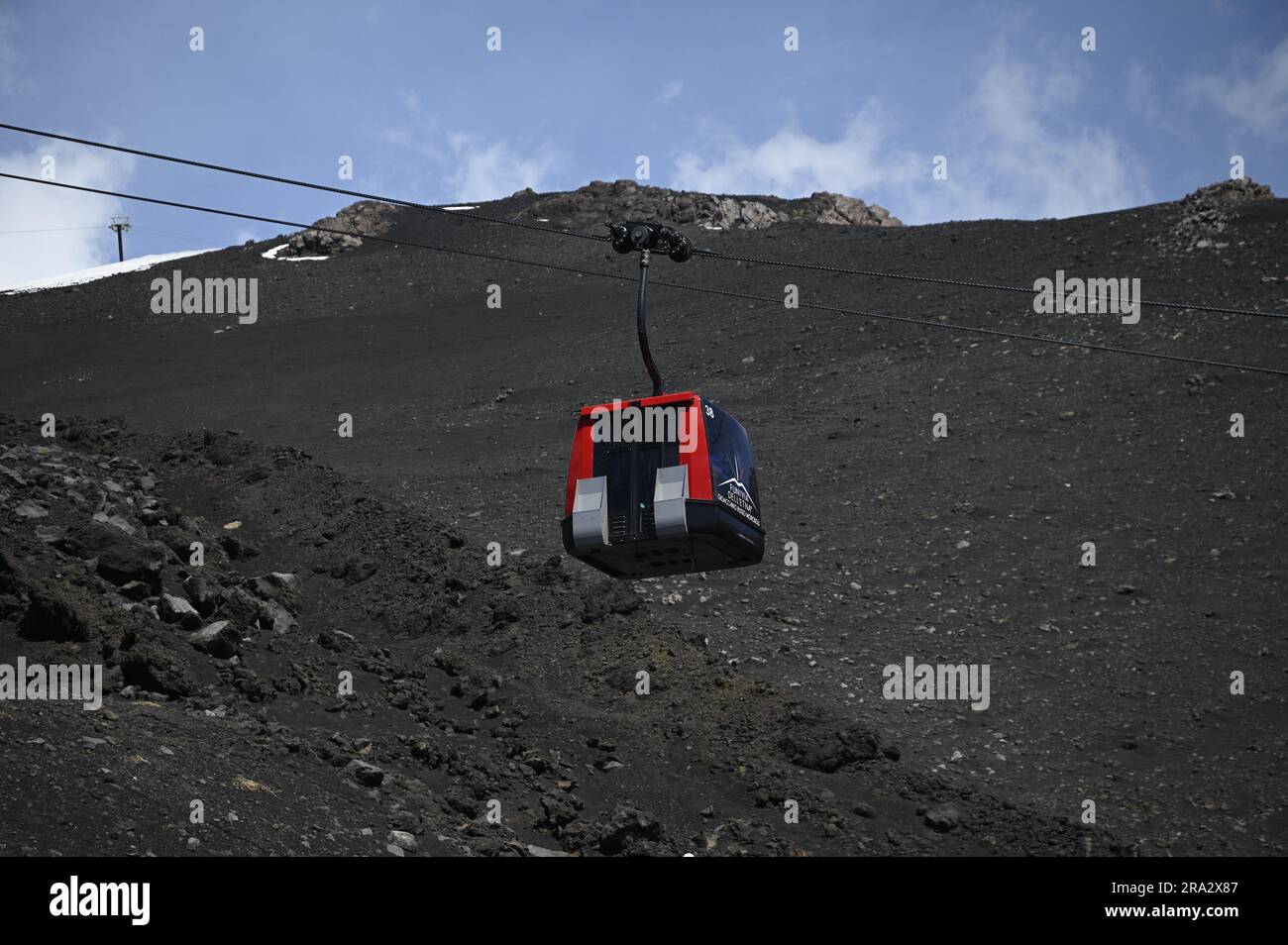 Volcanic landscape with scenic view of Funivia dell' Etna Sud the cable ...