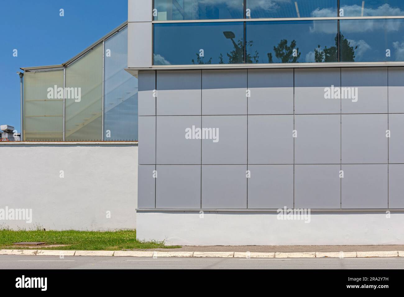 Grey Metal Wall at Factory Building Exterior Stock Photo - Alamy