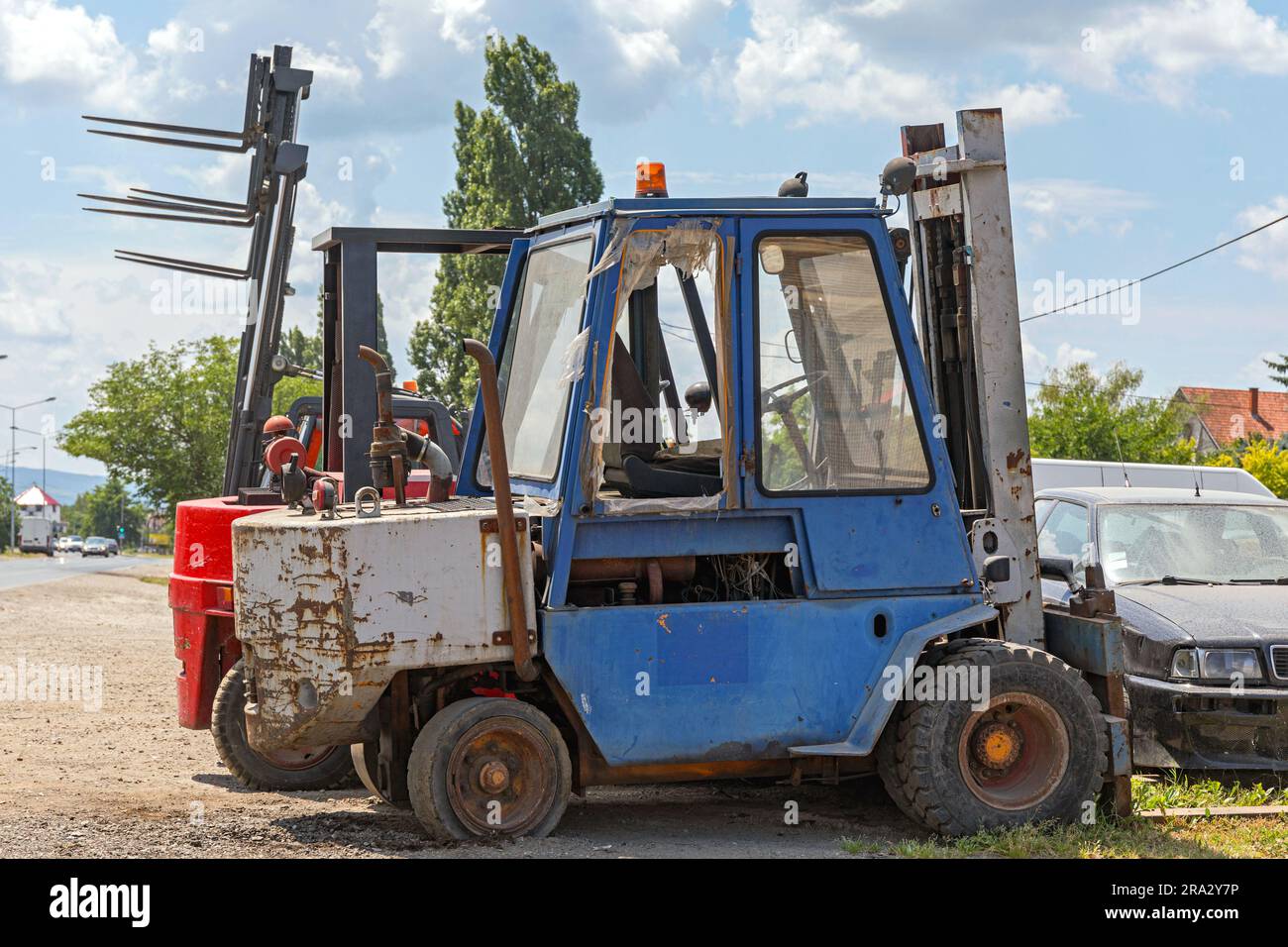 Old Rusty Forklift Trucks With Broken Glass Abandoned Stock Photo - Alamy