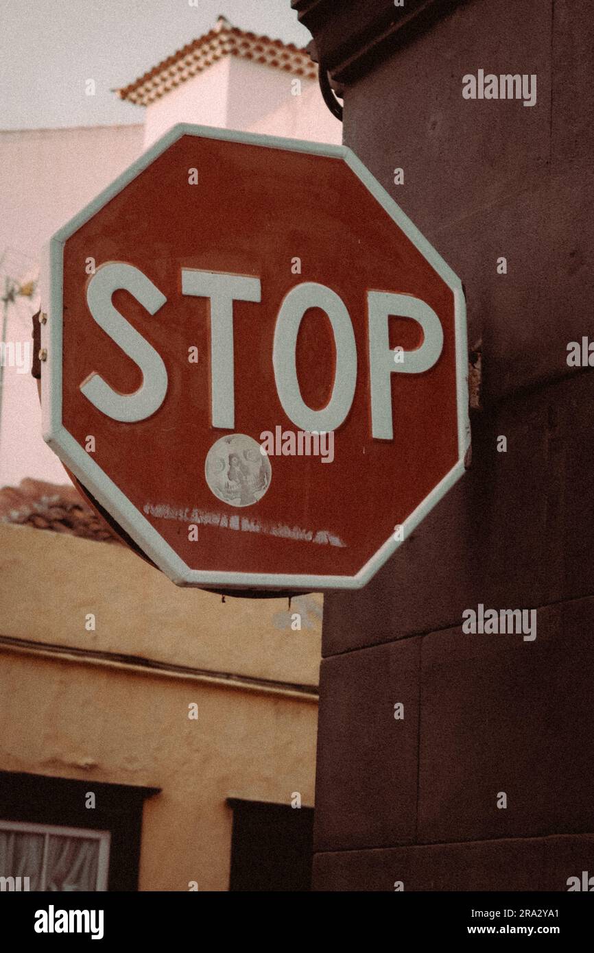 A vivid image of a traditional red octagonal stop sign, with a vintage ...