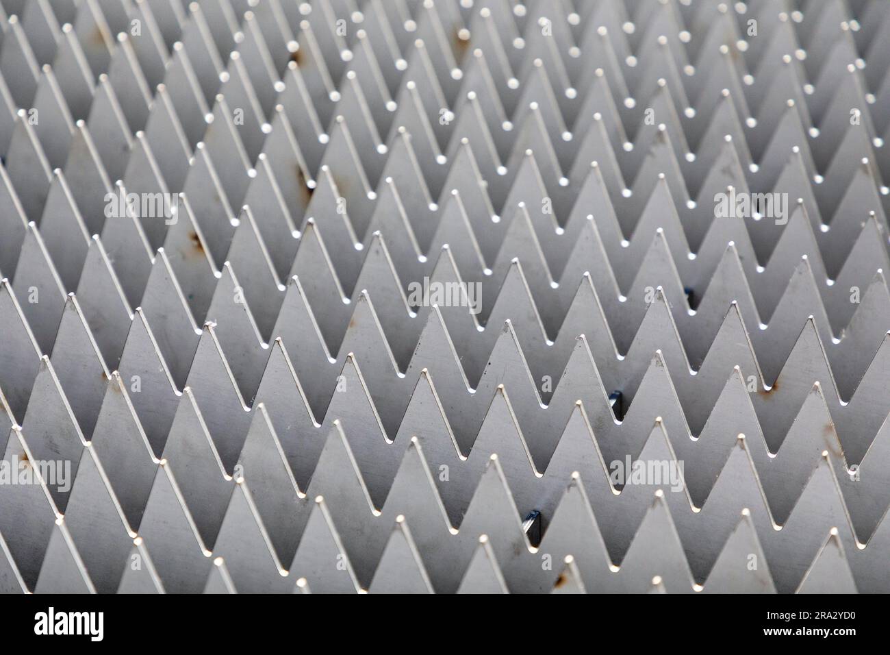 Triangular spikes hi-res stock photography and images - Alamy