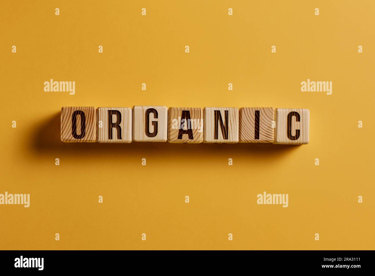 organic word written on wood block. organic text on table, concept ...