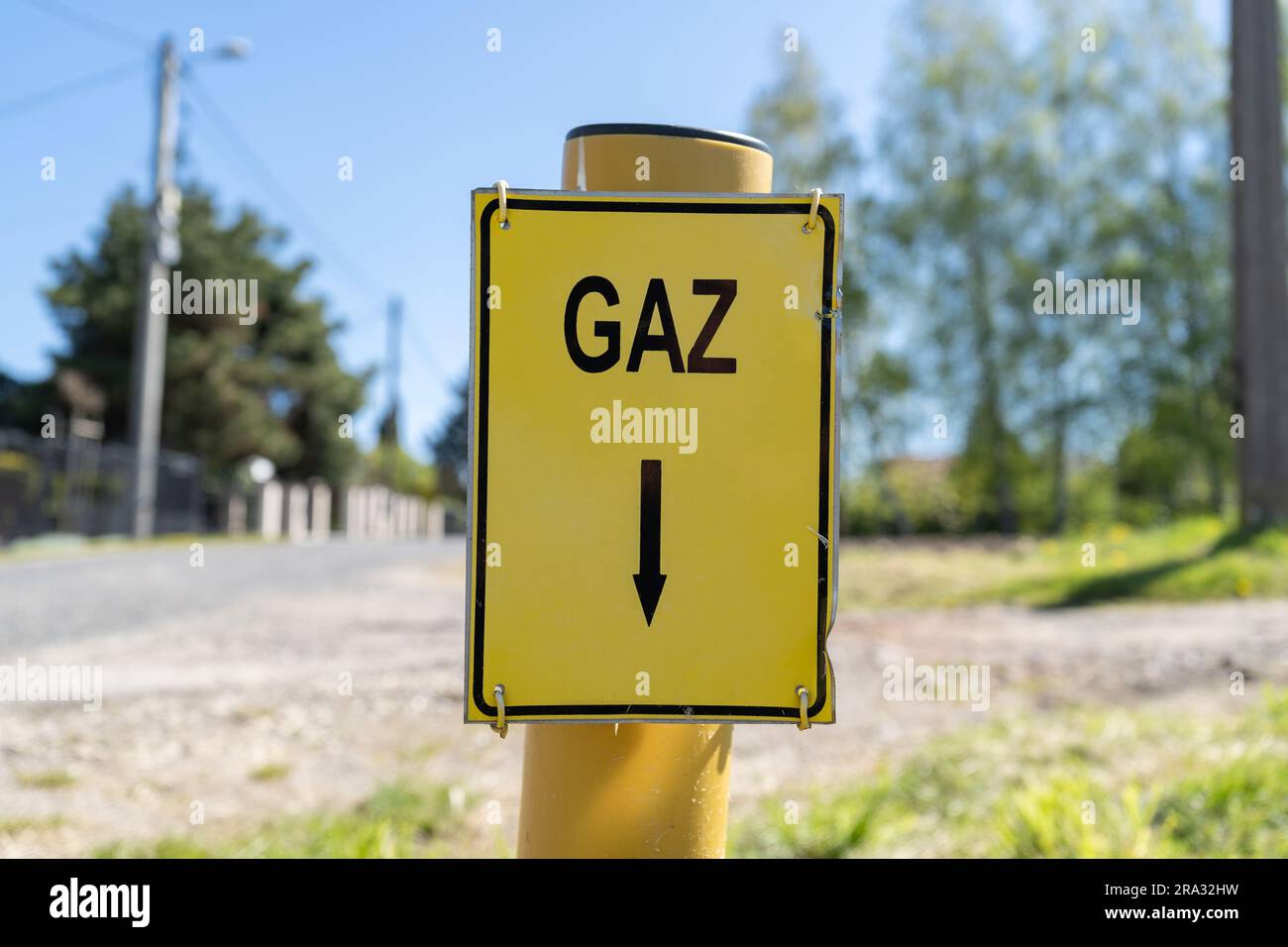 Location plate for gas pipeline in Poland. Yellow aluminum sign ...