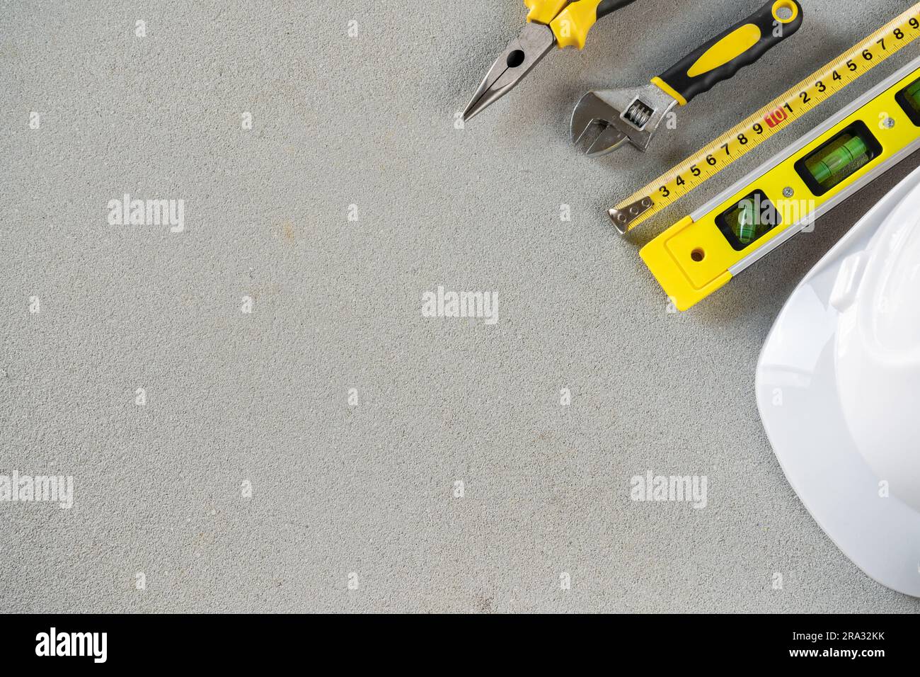 Hard hat safety helmet and working tools for construction site worker ...