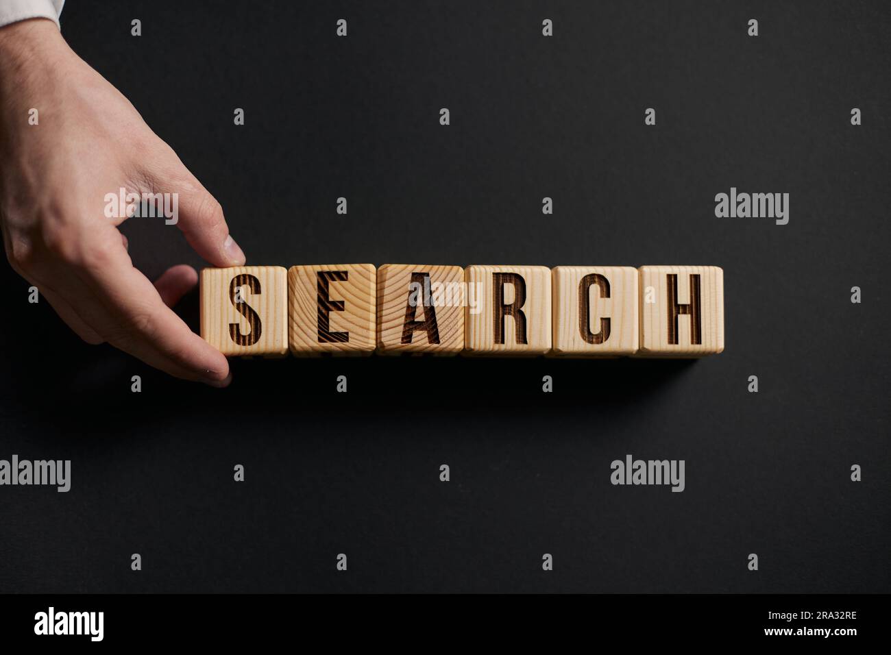 Word search on wooden cubes. Word concept Stock Photo - Alamy