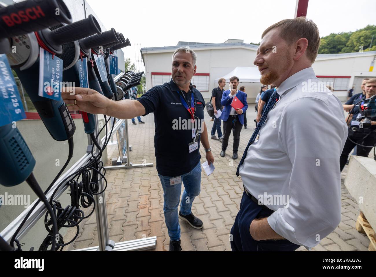 Sebnitz, Germany. 30th June, 2023. Martin Thiel (l), Head of Quality at ...
