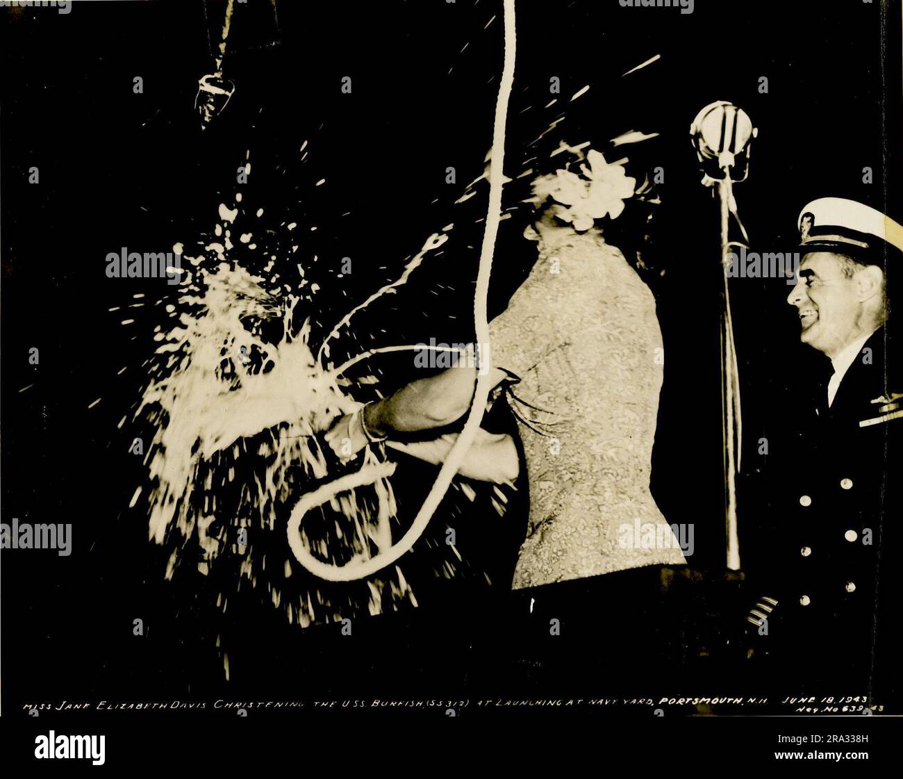 Miss Jane Elizabeth Davis Christens the USS Burfish. Original caption ...