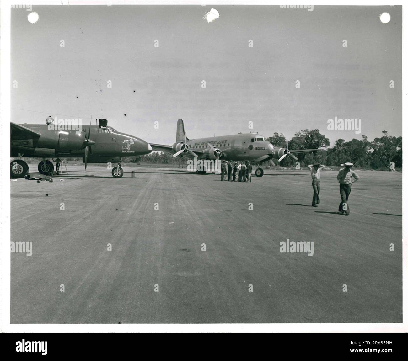 Photograph of The Truculent Turtle and a Naval Air Transport Service ...