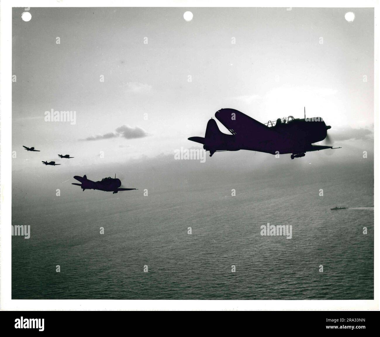 Photograph of Airplanes in Flight Over Water and Ship Stock Photo - Alamy