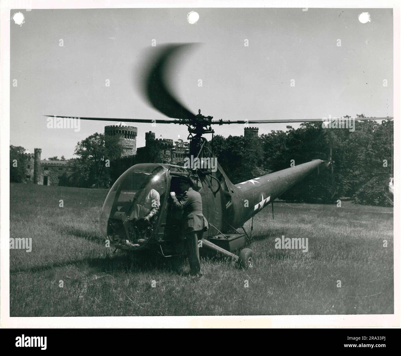 Photograph of Helicopter and Two Lieutenant Commanders Stock Photo - Alamy