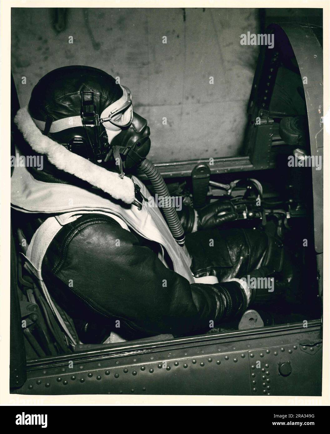 Photograph of "Pilot with Oxygen Mask in Cockpit" of Airplane Stock ...