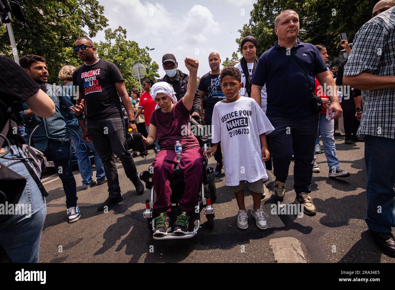 A child and his mother seen demanding justice for Nahel during the ...
