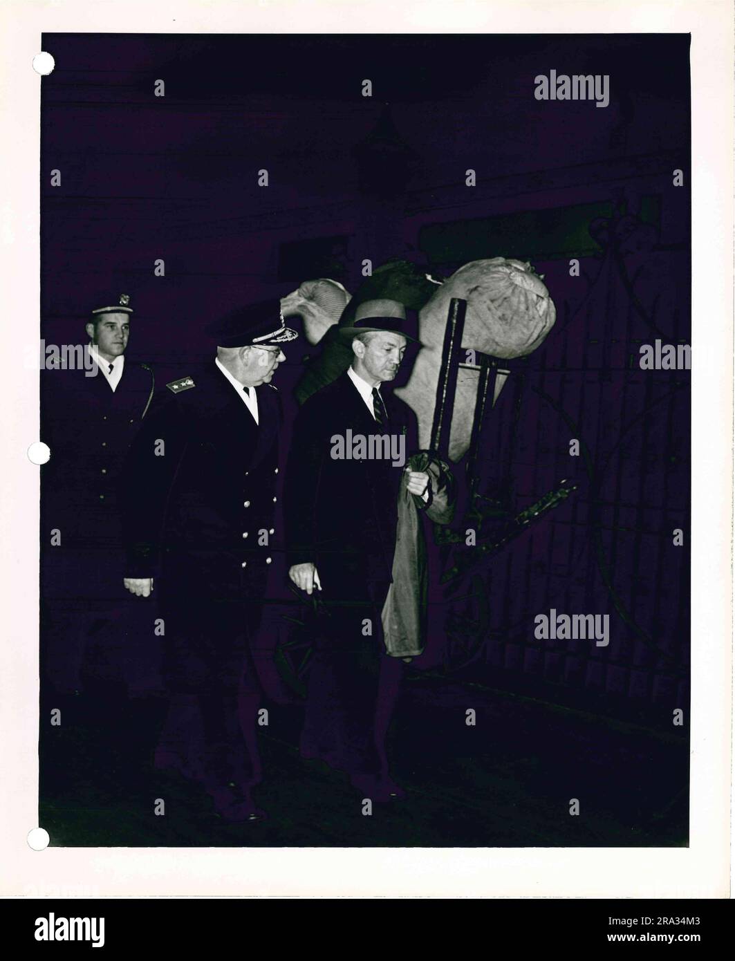 Photograph of Three Men Walking Stock Photo - Alamy