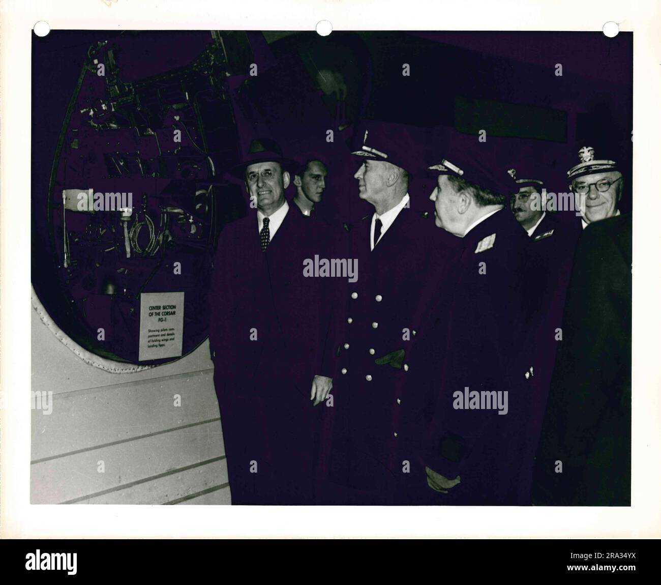 Photograph of Admiral Ernest J. King and Other Officers Looking at Exhibit for Corsair FG-1 ...