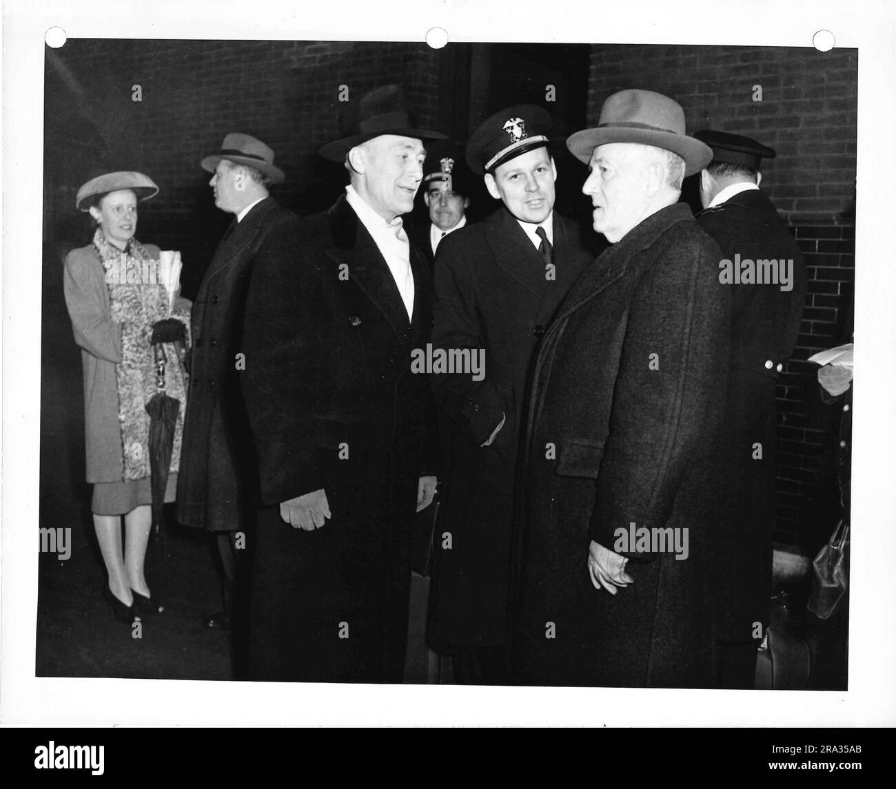 Photograph of Several People Talking Stock Photo - Alamy