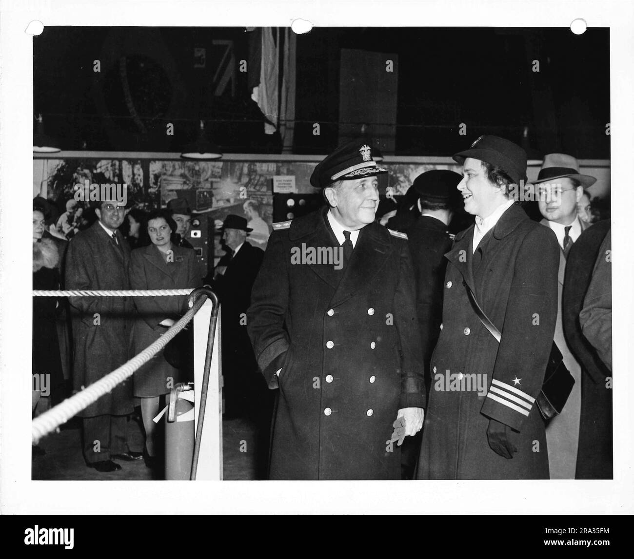 Photograph of Female Military Officer Talking with Male Military ...