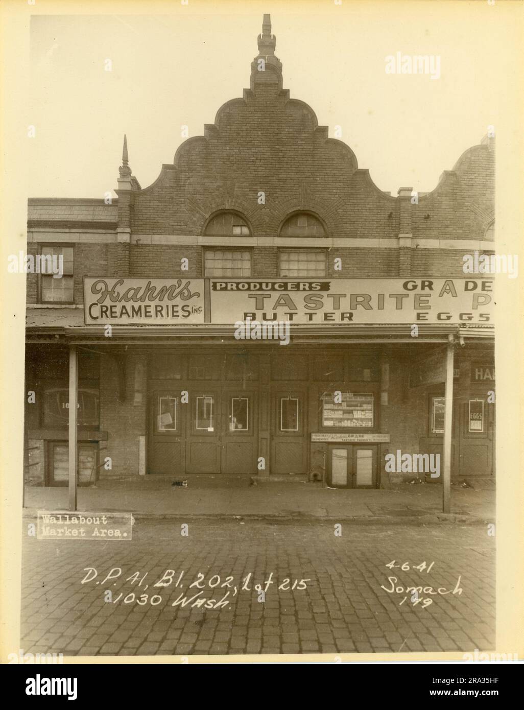 Photograph of exterior of lot 215, Bl. 202, 1030 Wash.. Depicts ...