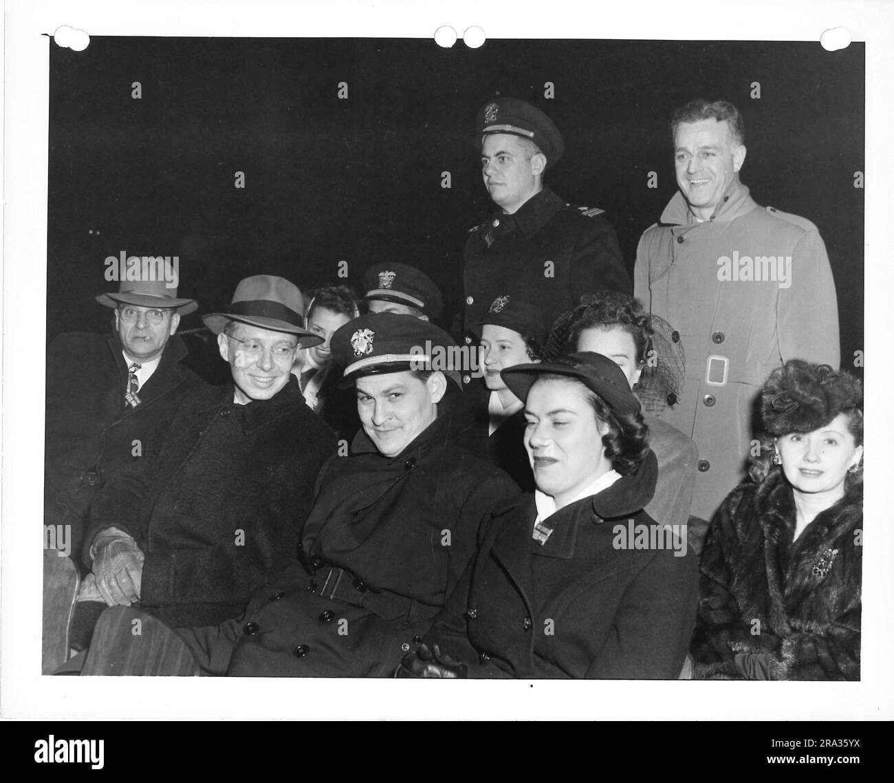 Photograph of Men and Women in Military and Civilian Attire Stock Photo ...