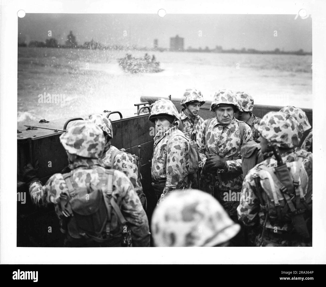 Photograph of Military Individuals in a Water Landing Craft Stock Photo ...