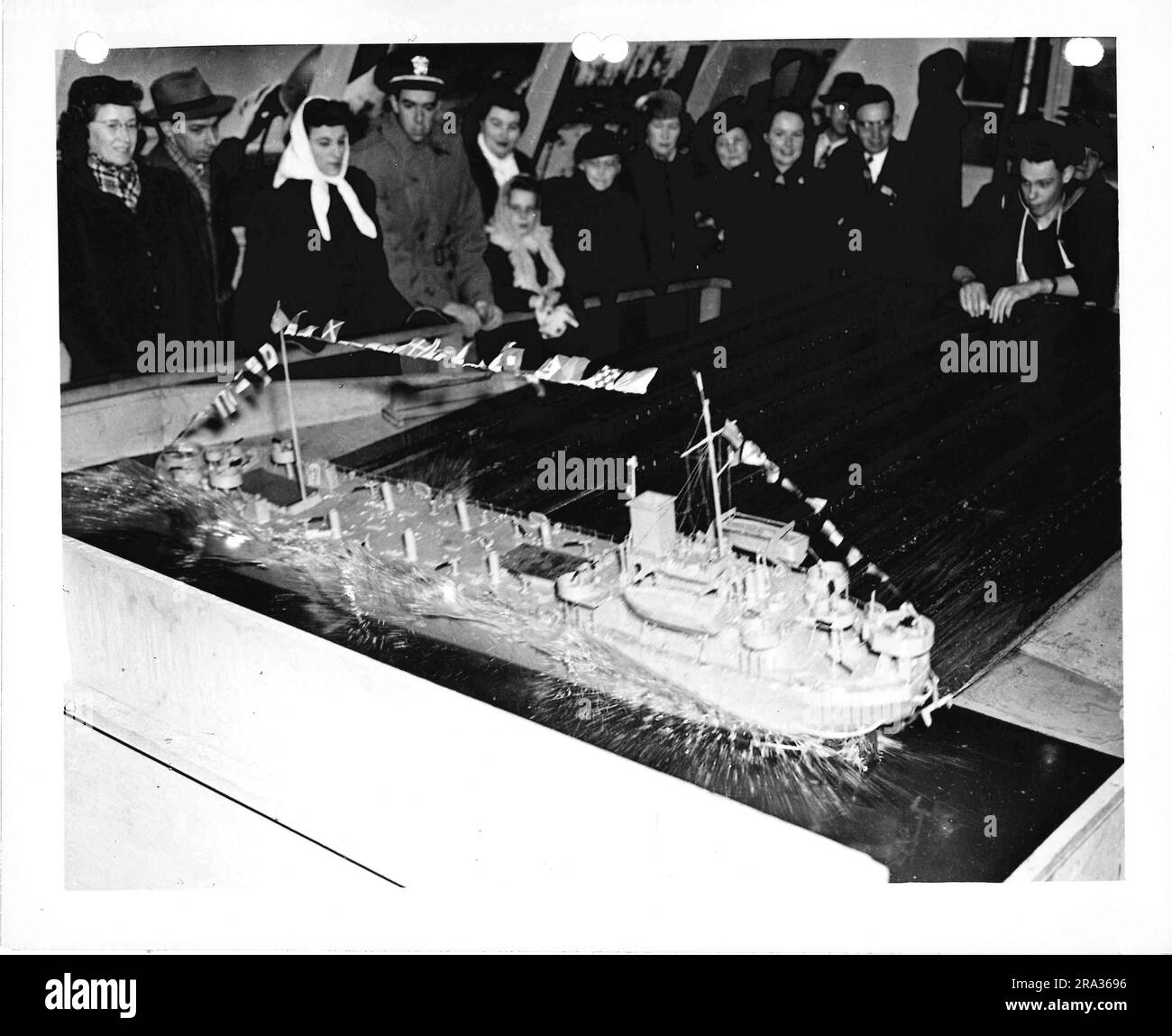 Photograph of Sideways Launch of a Model Military Ship Stock Photo - Alamy
