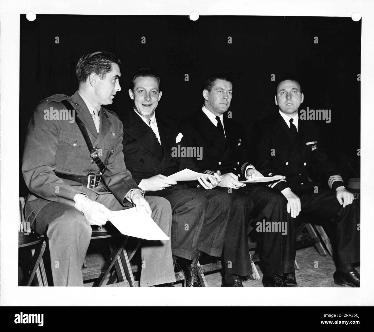 Group four seated men hi-res stock photography and images - Alamy