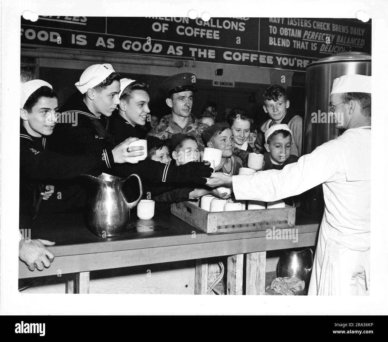 Photograph of Children and Sailors Getting Coffee from Another Sailor ...
