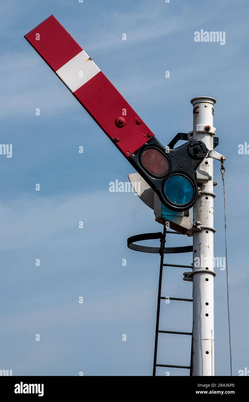 Old fashioned railway signal on green Stock Photo - Alamy