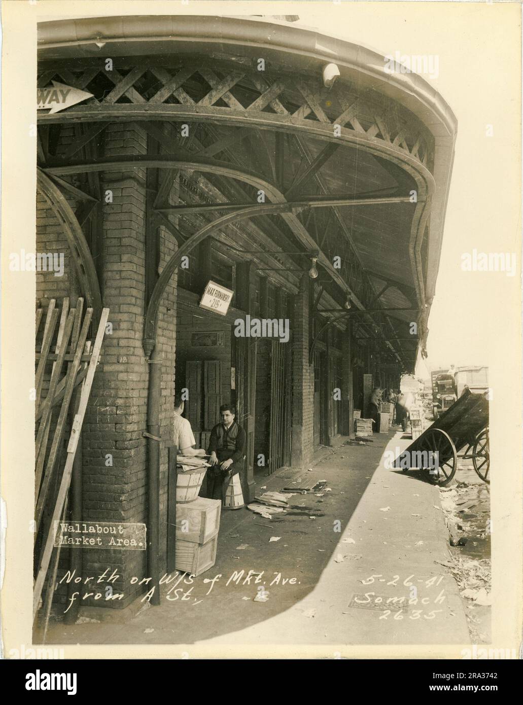 Photograph of sidewalk outside market buildings looking north on west ...