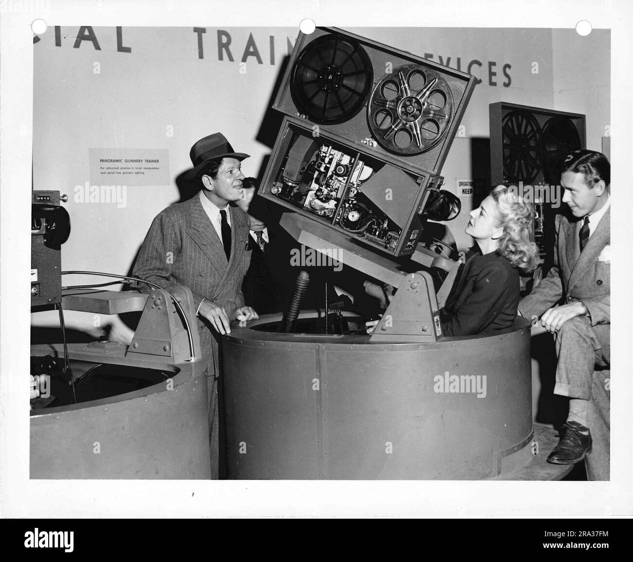 Photograph of Woman Looking at Exhibit Using Film Stock Photo - Alamy