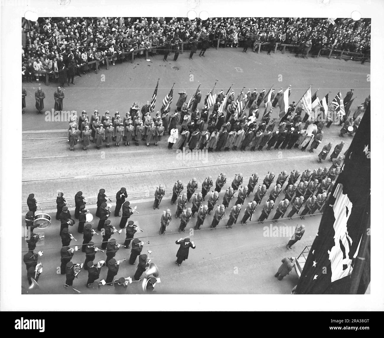 Photograph of Military Parade - Band in Front of Crowd and Flags Stock ...