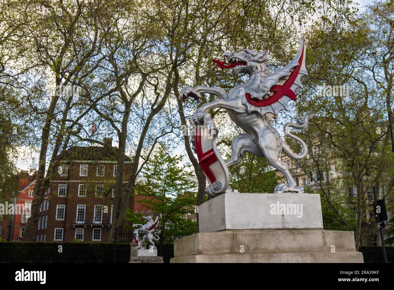 Historic and iconic London dragon statues holding a shield with the ...