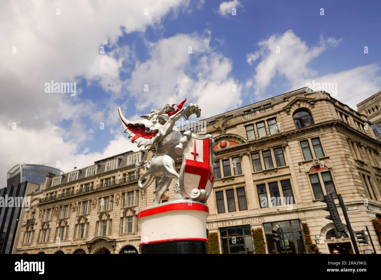 Historic and iconic London dragon statues holding a shield with the ...