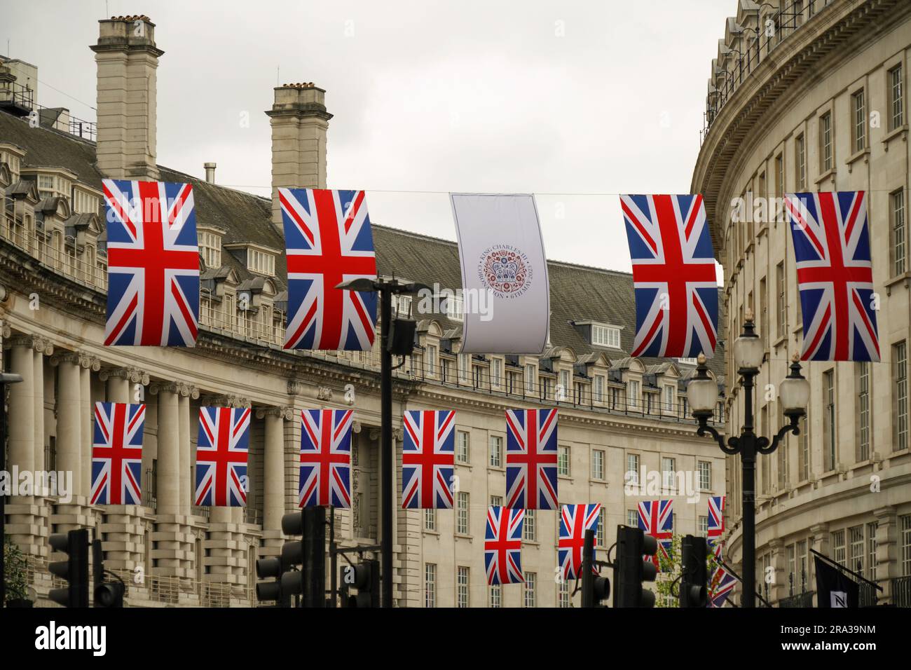 UK Union Jack flags and a King Charles III Coronation flag decorate ...