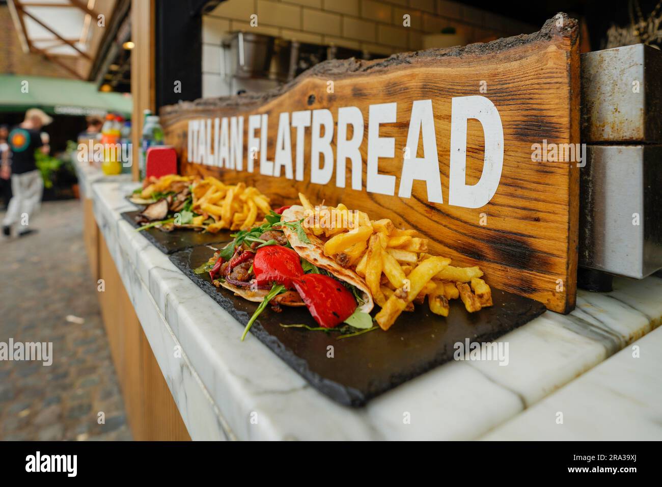 Italian flatbread food and sign at London's famous Camden Market. The ...