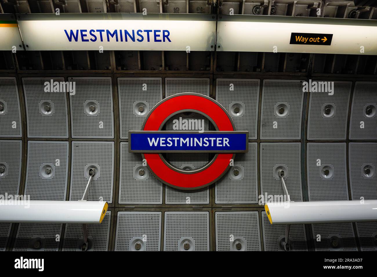 Iconic London Underground sign at Westminster station, also shows the ...