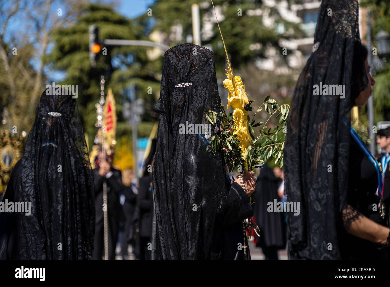 Holy Week religious processions in Madrid, Spain. Widows, women in ...