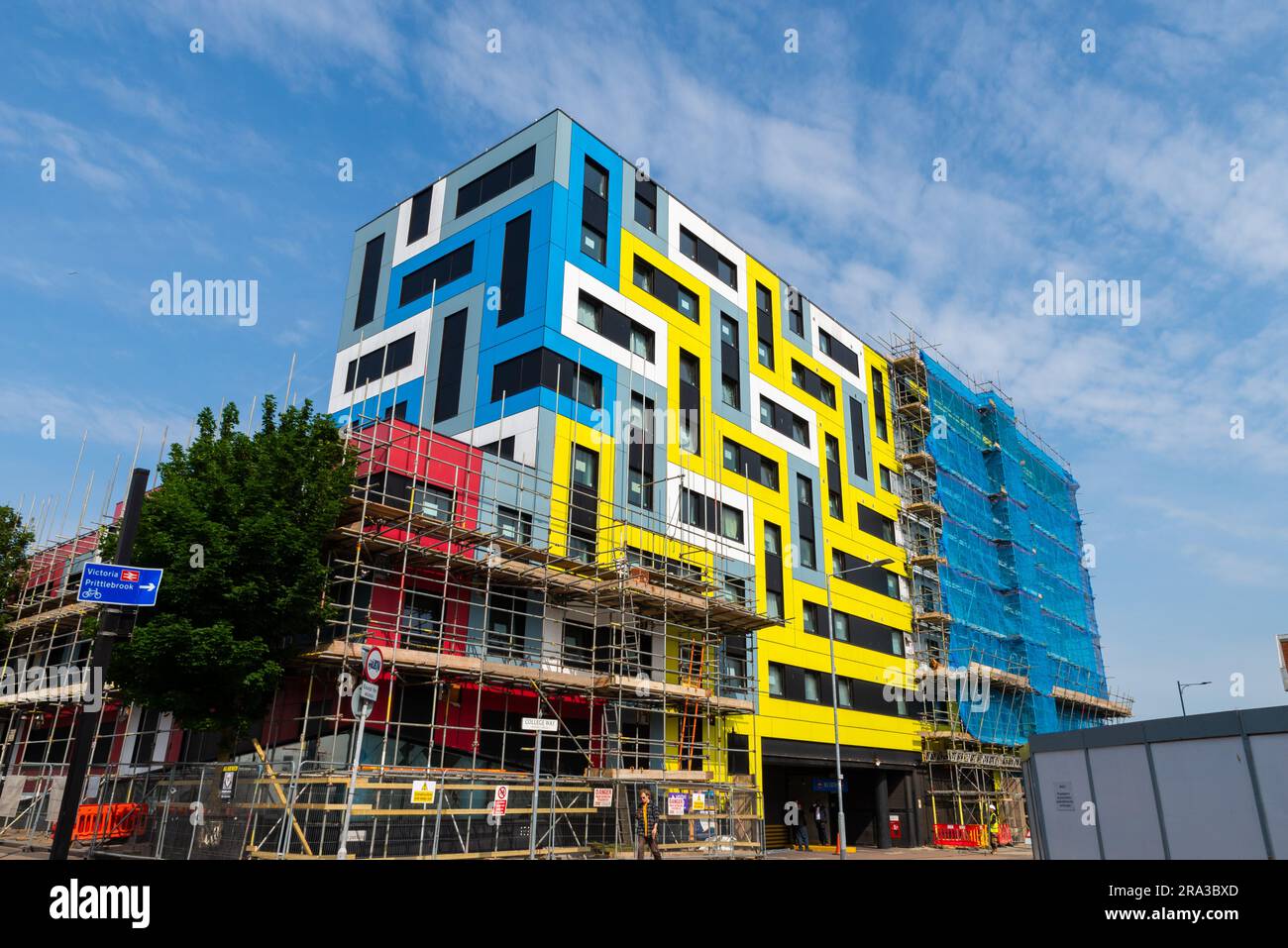 Work underway to replace the colourful cladding on the University of ...