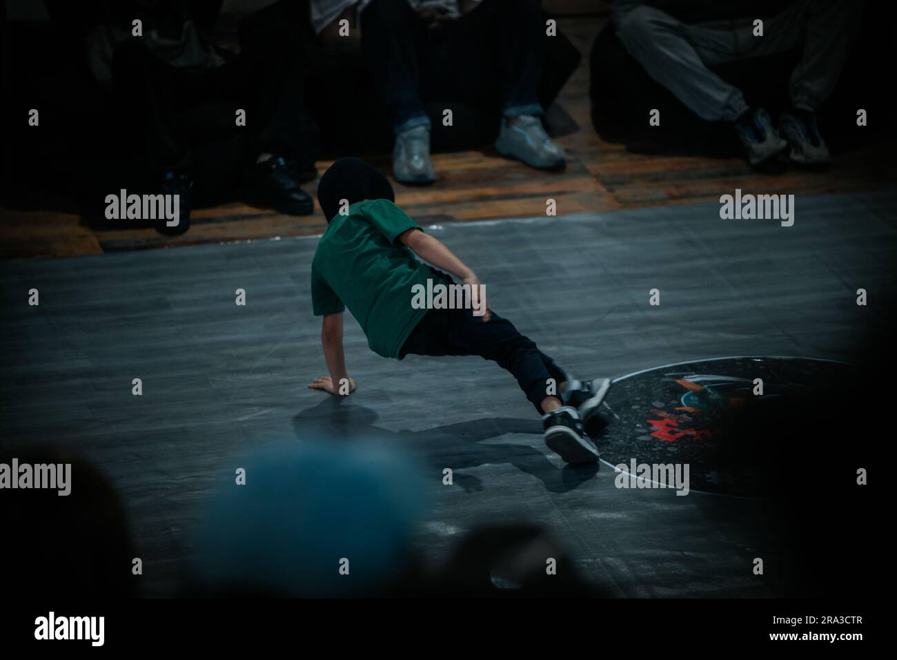 A young adult person performing tricks on a ground surface Stock Photo ...