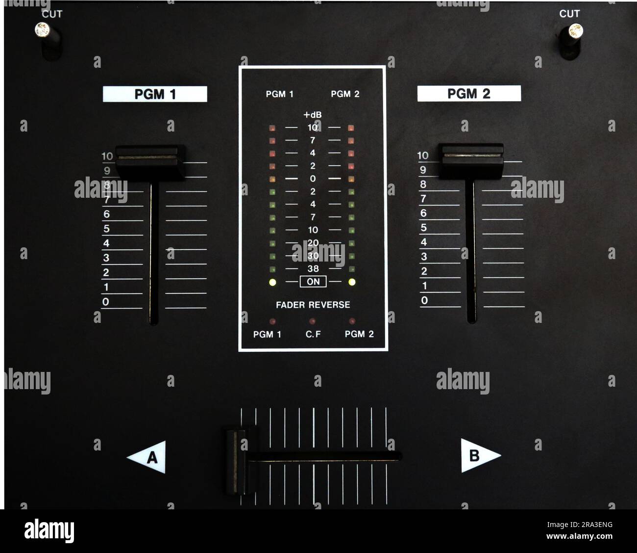 DJ mixer close up with hand (super analog with crossfader) volume knobs ...