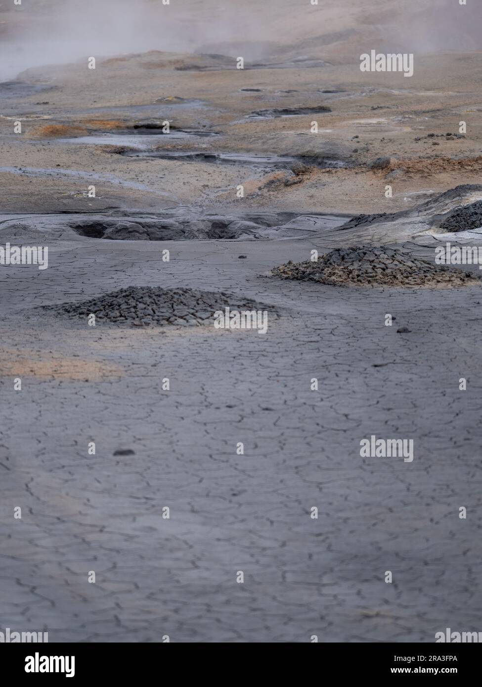 A close-up shot of an earthen ground composed of small grey rocks and ...