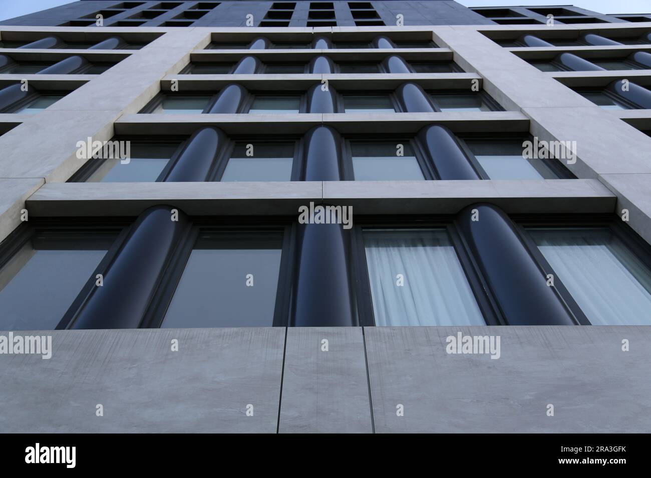 tall building facade (view looking up) modern apartment housing and ...