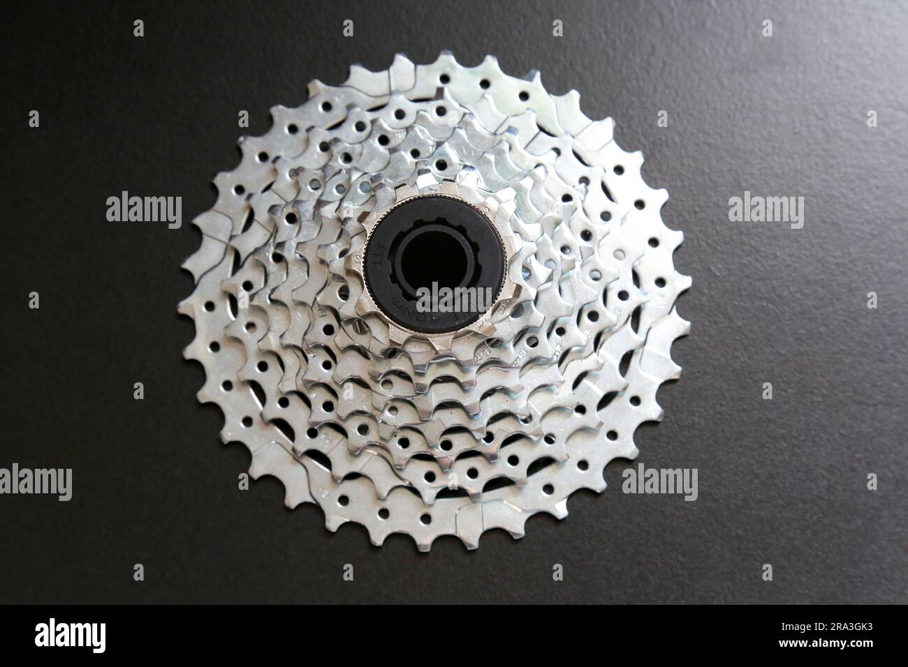 bike cassette 8-speed close up silver on black background Stock Photo ...