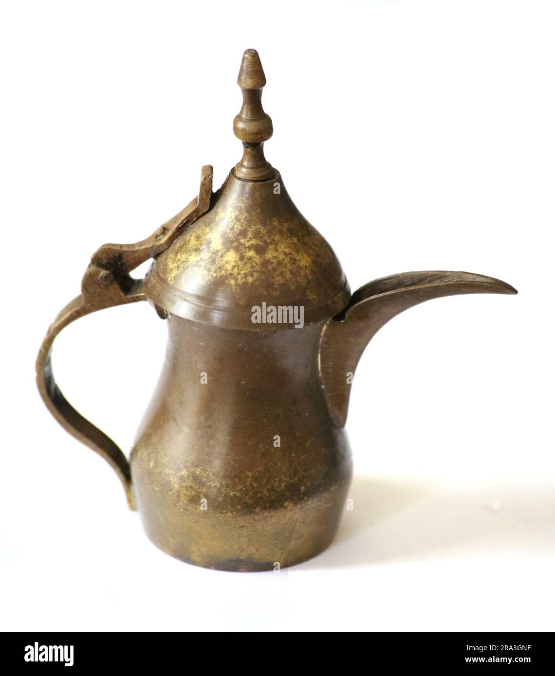 arabic coffee pot (dallah) miniature figurine brass on white background ...