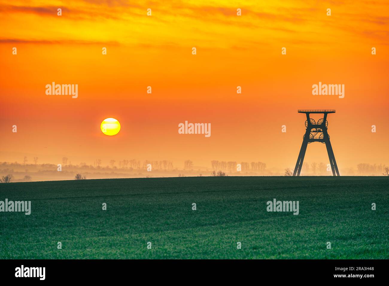 Sunrise at the winding tower for the copper mine Stock Photo - Alamy